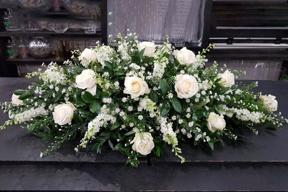 Rose and Aster Casket Display | Farima Perry Florals & Events